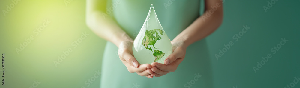 Woman hand holding earth in water drop shape, save water and help ...