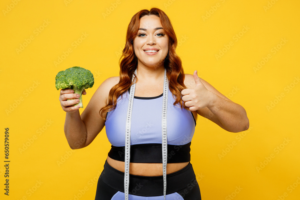 Young chubby overweight plus size big fat fit woman wears blue top warm ...
