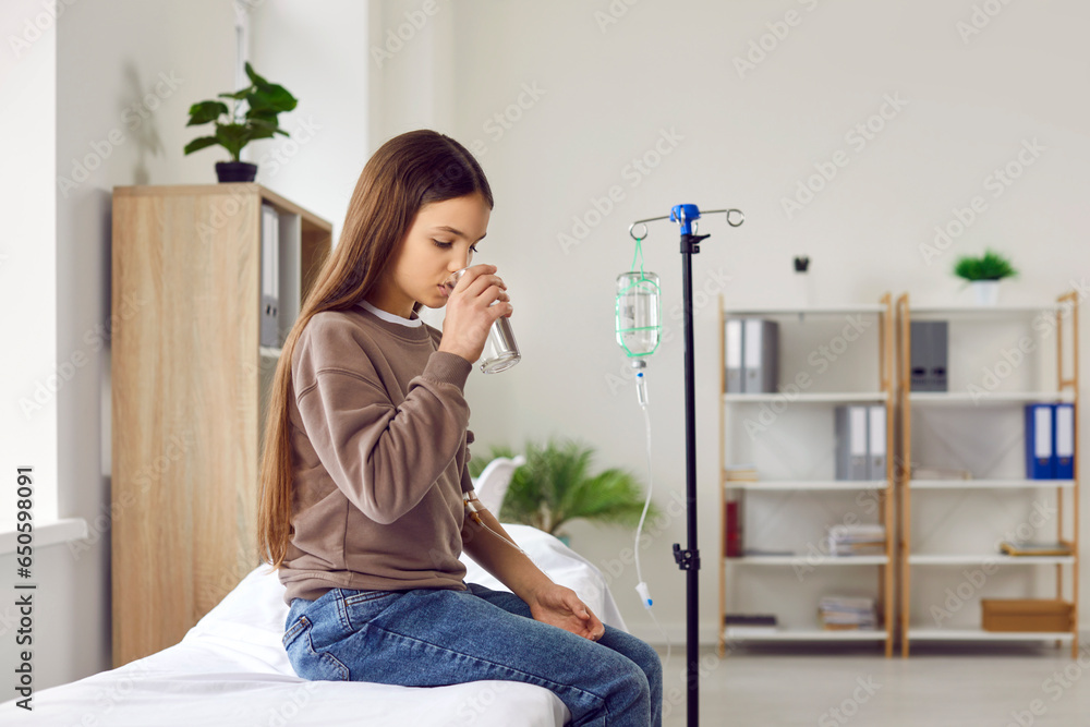 Child patient getting intravenous therapy at clinic or hospital. Sick ...