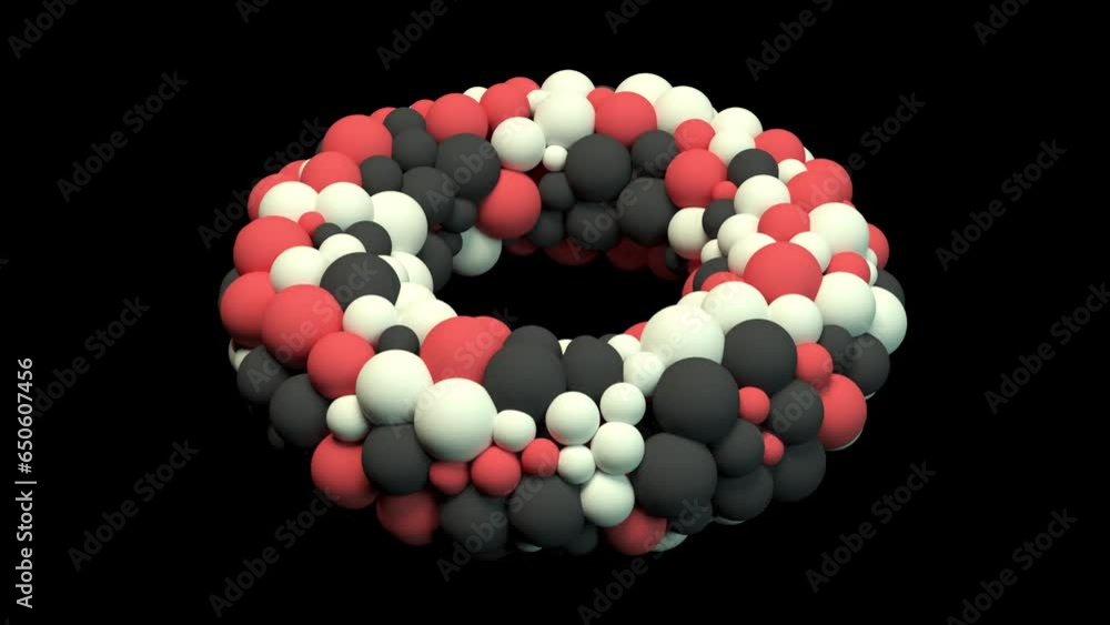 Three-dimensional torus consisting of colored rotating spheres breaks ...