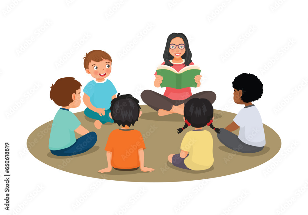 Young female teacher explaining lesson telling story to group of ...