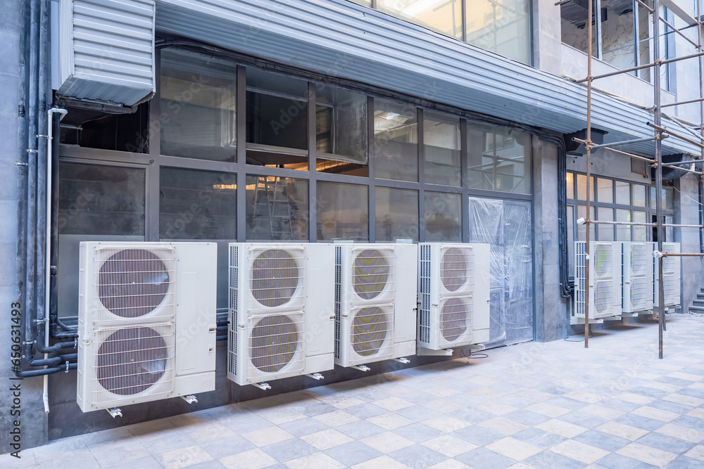 Air conditioners on facade building. Blocks from climatic equipment ...