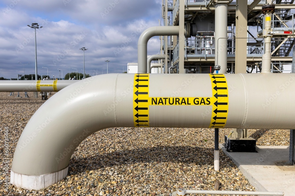 Natural gas main high pressure pipeline with yellow label Stock Photo ...