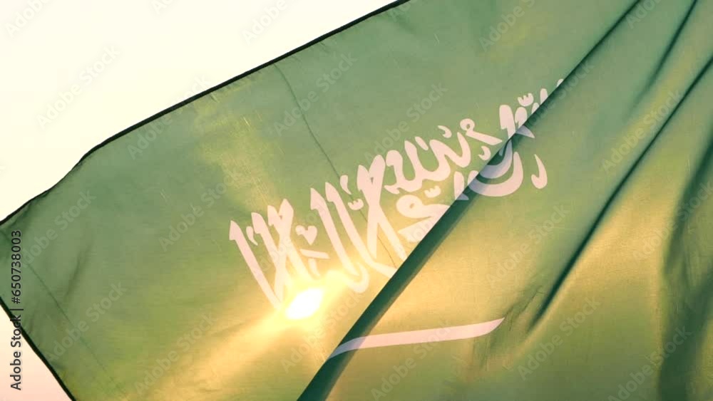 Saudi National Day. Saudi Arabia flag waving in sky against wind ...