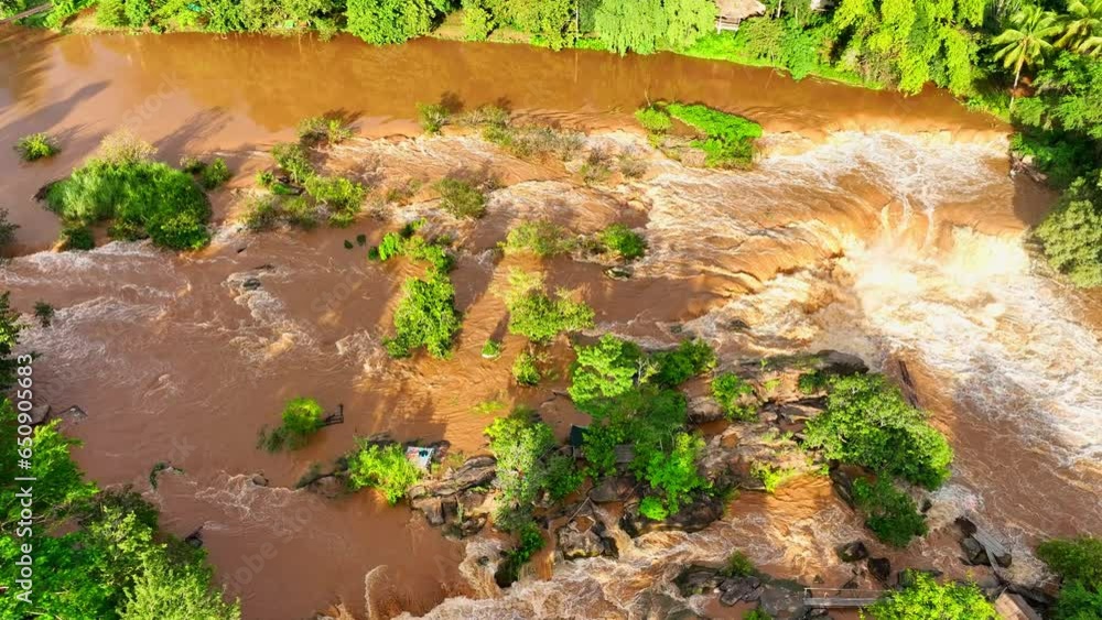 A waterfall flood, when viewed from an aerial perspective, presents a ...