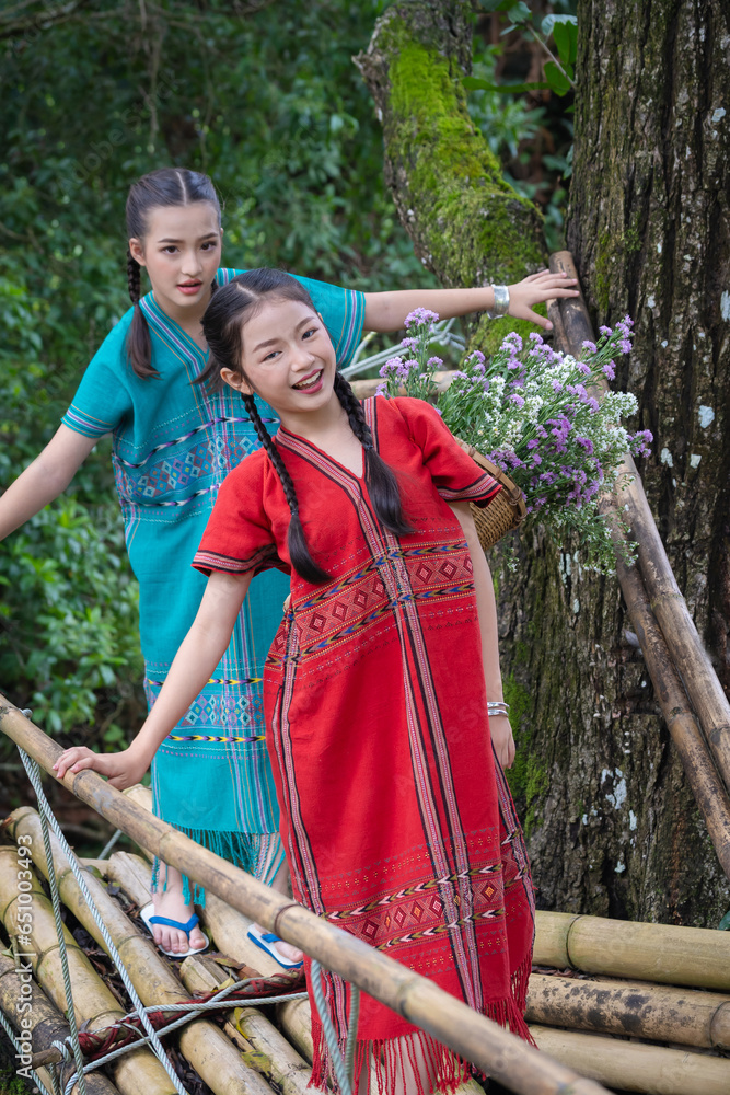 Teenagers and young girls group wearing Karen dresses are walking ...