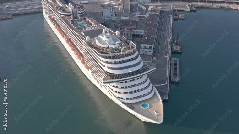 Massive luxury cruise ship docked at port of Genova, Italy. Aerial view ...