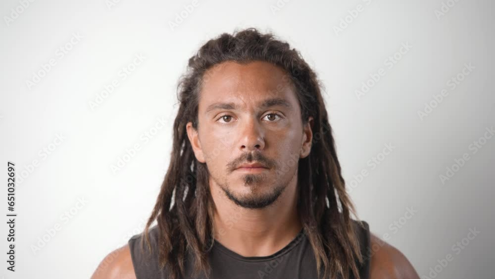 Handsome person look at camera close up. Young adult man face portrait ...