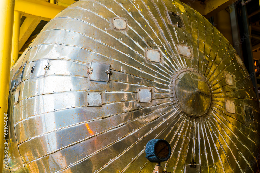 The heated encapsulated pressure vessel is protected by insulation to ...