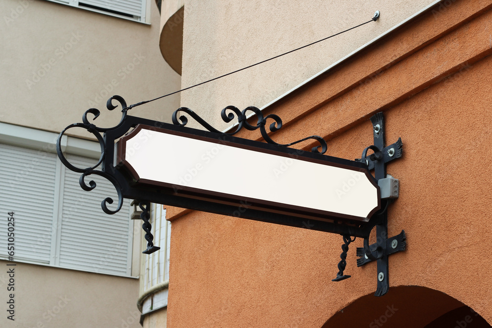 Classic signage mounted on a wall for advertising mockup. Sign template ...