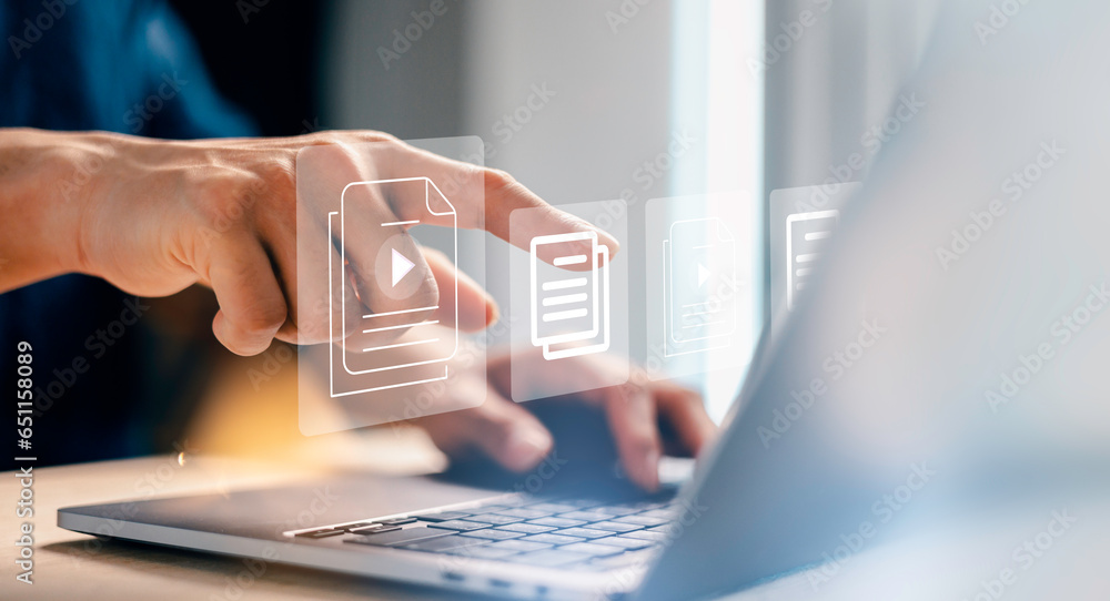 Document management system Businessman working on laptop computer ...