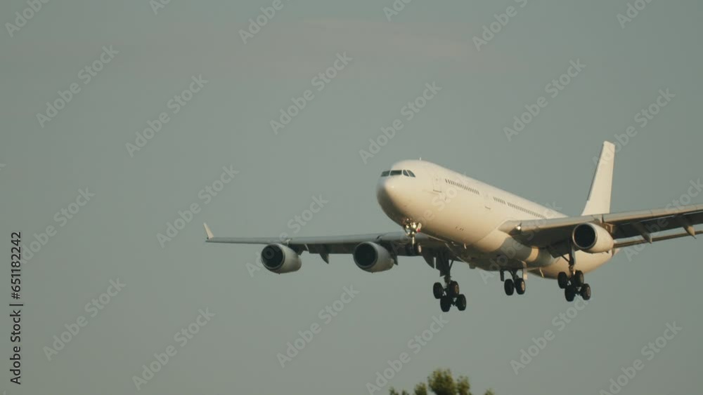 Close-up of the flight of passenger airplane in the sky on low high ...