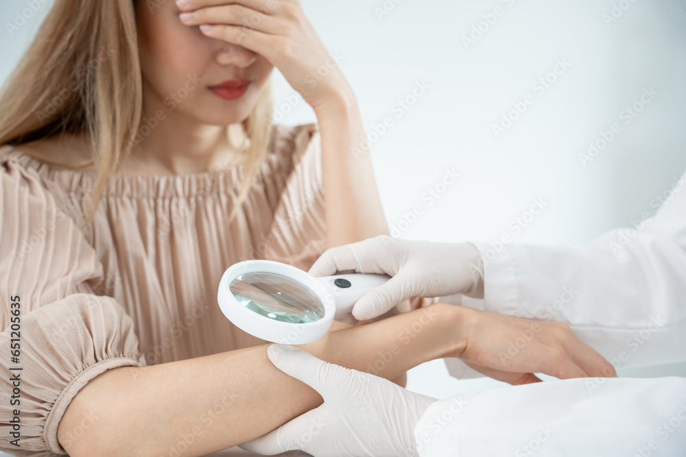skin problem and beauty of asian girl. Dermatologist use magnifying ...