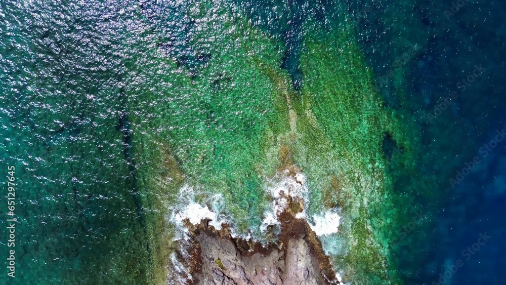 Big atlantic ocean waves meet the rocky coasts of the Canary Island of ...