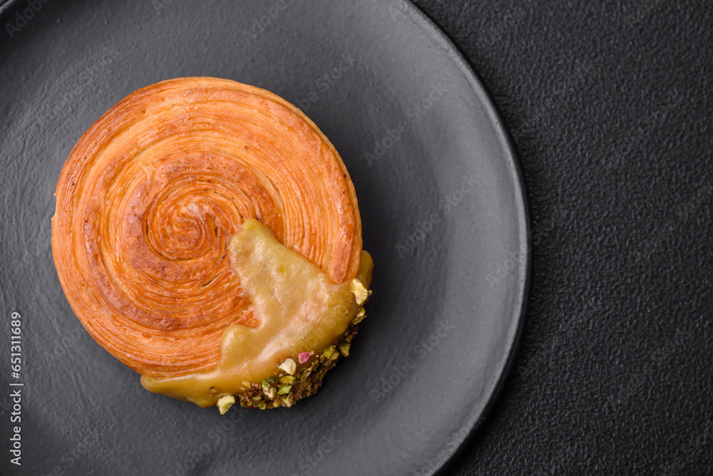 Round puff pastry croissant with raspberry filling or new york roll ...