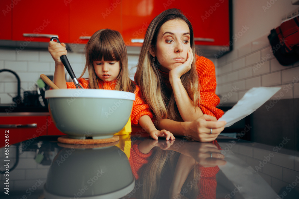 Funny Mom Holding Ingredients List While Cooking with her Daughter ...