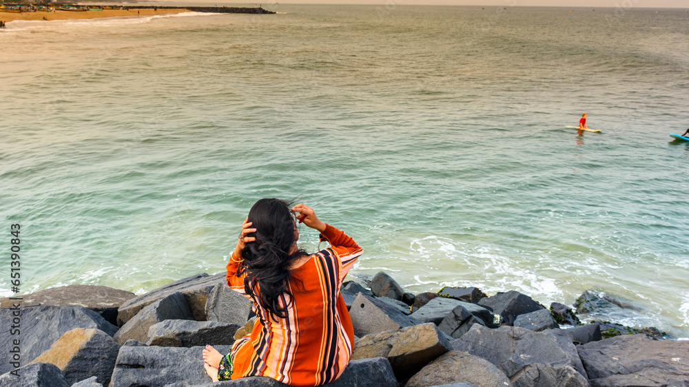 Young Indian woman relaxing in of serenity beach at Pondicherry (Now ...