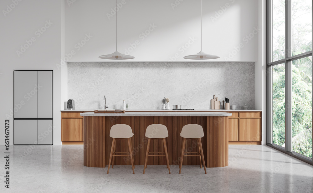 Cozy hotel kitchen interior with bar counter, cooking area and ...