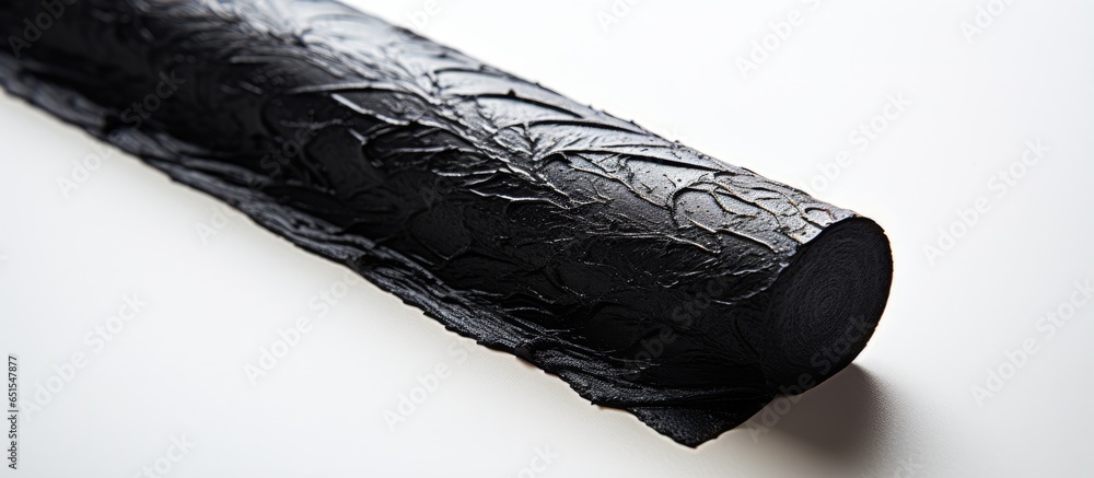 Black linocutting ink on wet dark lino texture isolated on white paper ...