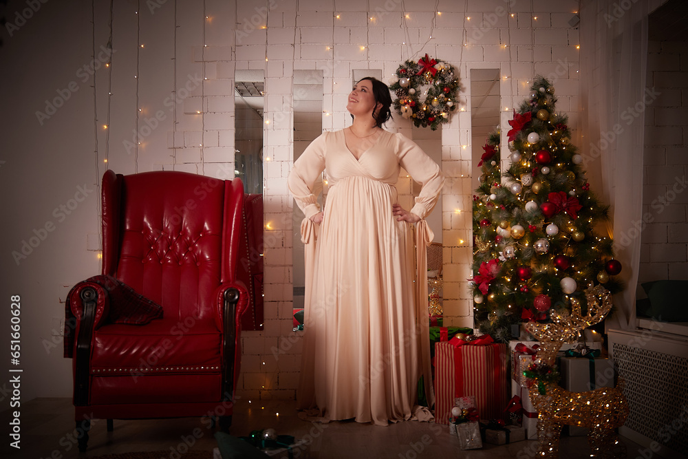 Owerweight elegant Woman at Christmas room. Fat plumb pretty girl in a ...