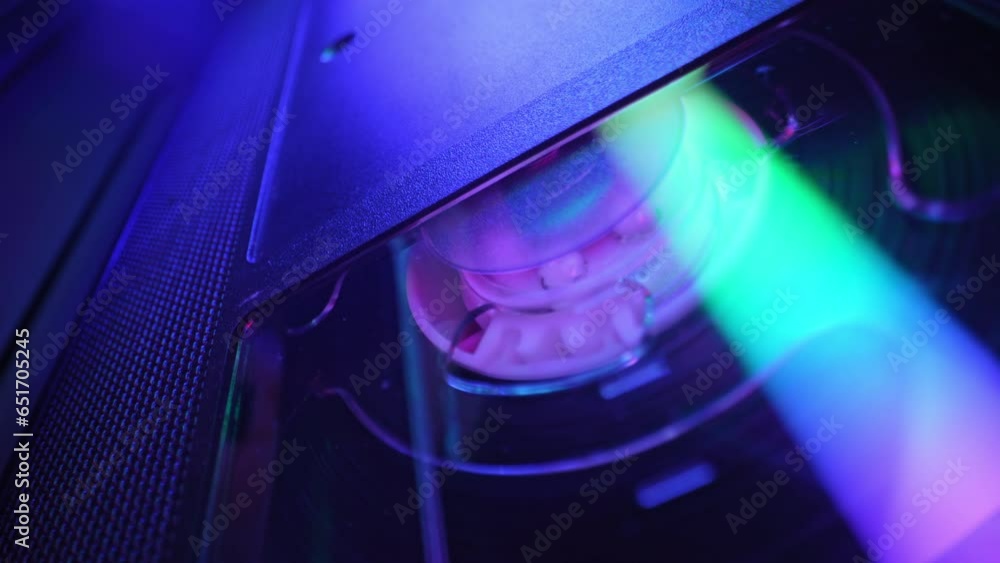 VHS mechanism inside, cassette player, magnetic head. Rotation reel ...