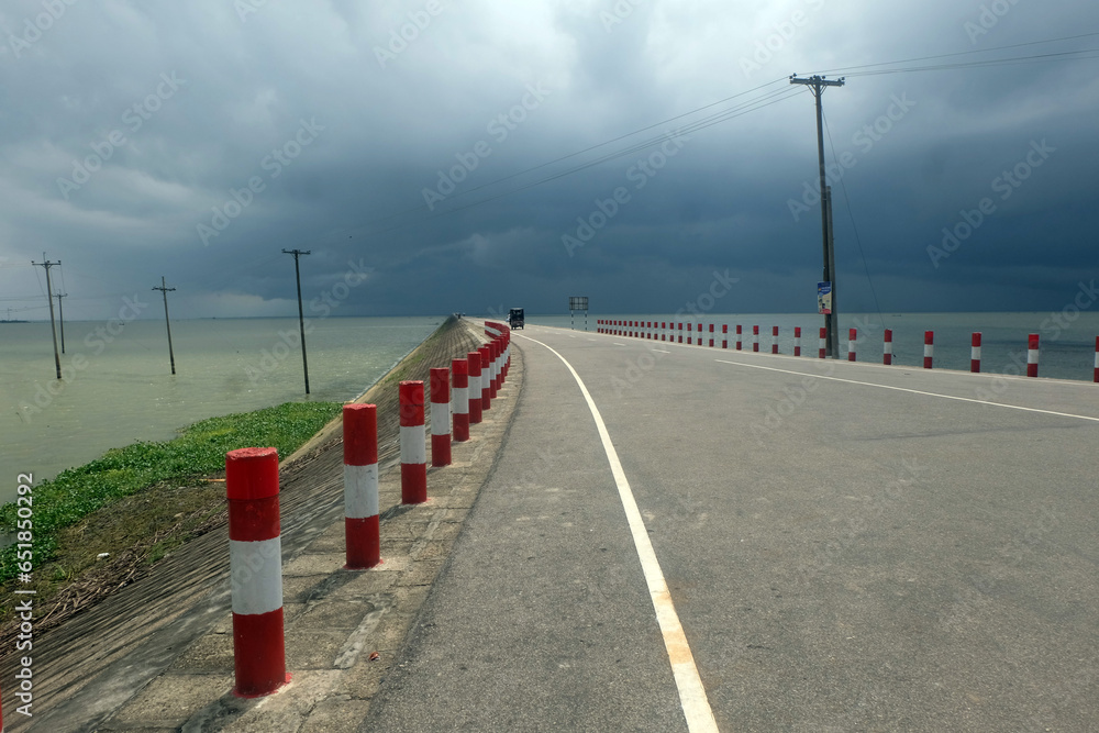 Nikli Kishoreganj is a mind-blowing road passing between water and sky ...