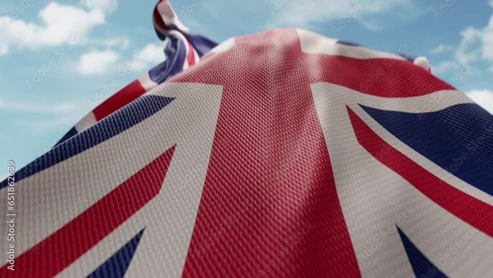 Wavy flag of United Kingdom blowing in the wind in slow motion. Waving ...