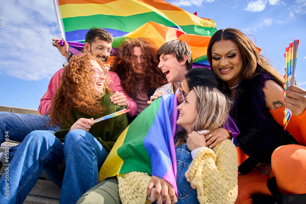 Group multi-ethnic excited people gathered to celebrate gay pride day ...