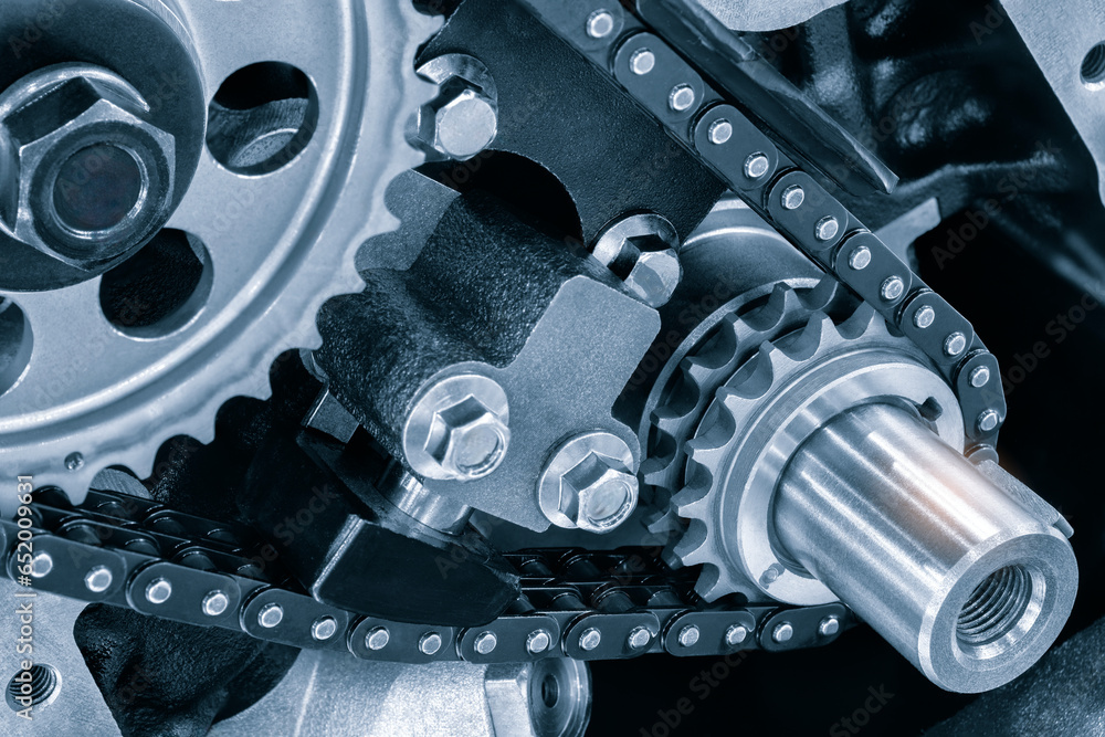 new car timing chain on a disassembled engine in a car workshop. Timing ...