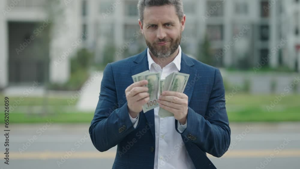 Slow motion of man counting money outdoor. Business man hold money ...