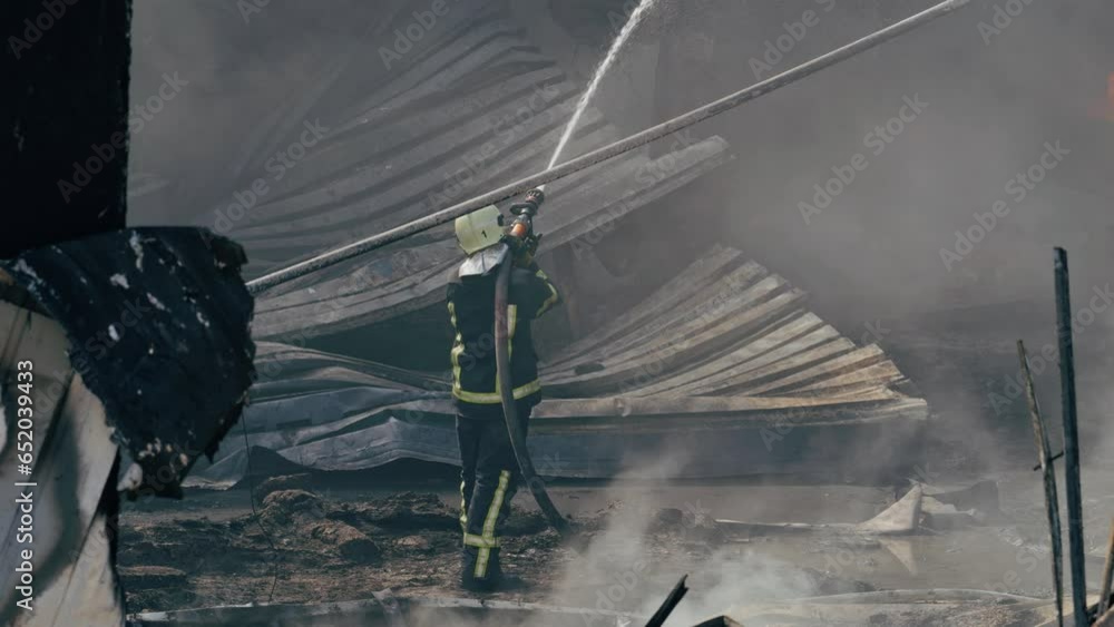 Fight fire Flame. Extinguish the Fire. Firefighter using a Firehose to ...