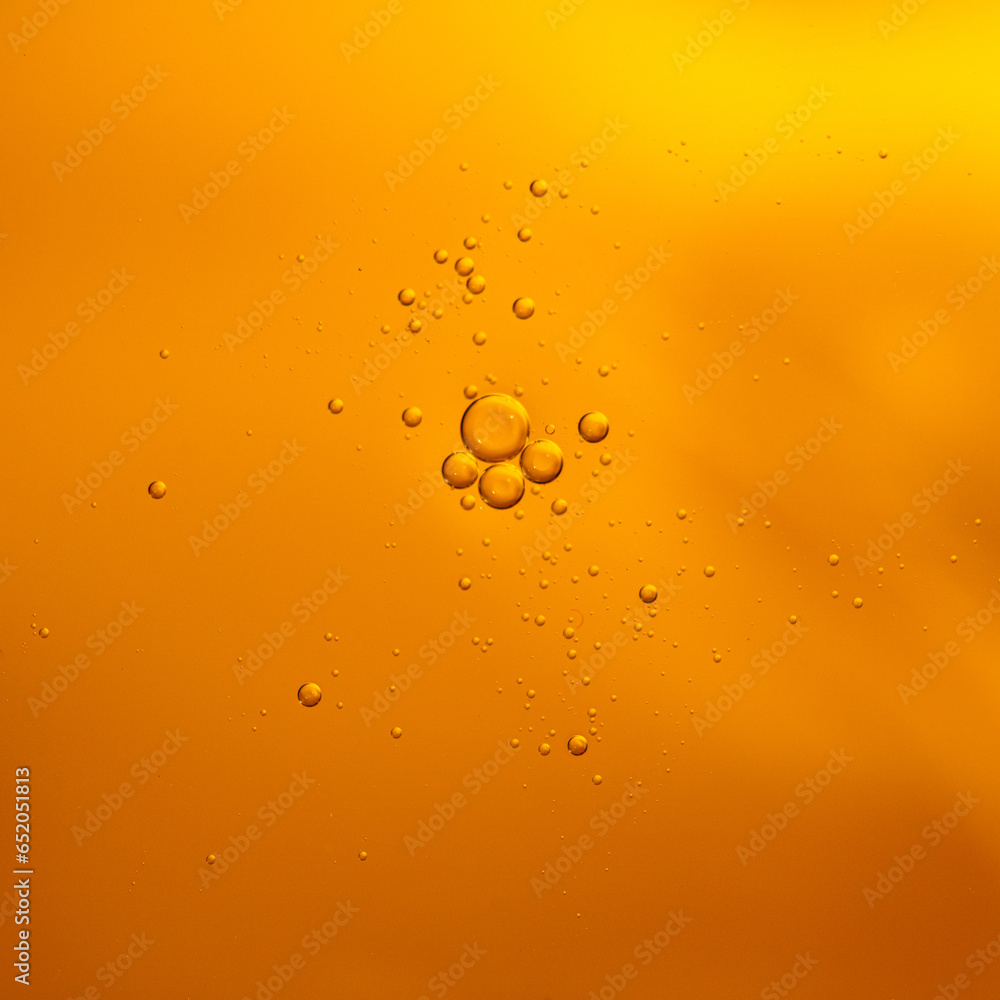 Poster Yellow oil bubbles on water, cooking oil background. – Wall Art ...