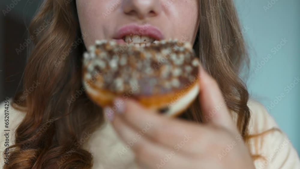 Close Up Portrait Of A Hungry 30s Woman Eating Donut With White Frosting Girl Sniffs Sweet