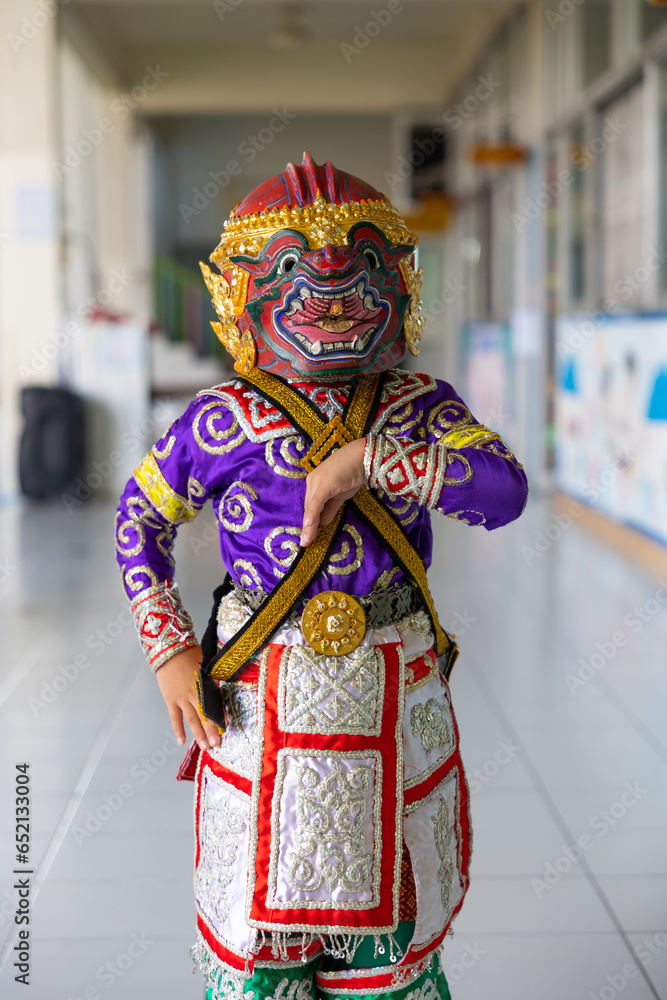Happy and smile Asian boy wearing Hanuman Khon. Hanuman is Thailand ...