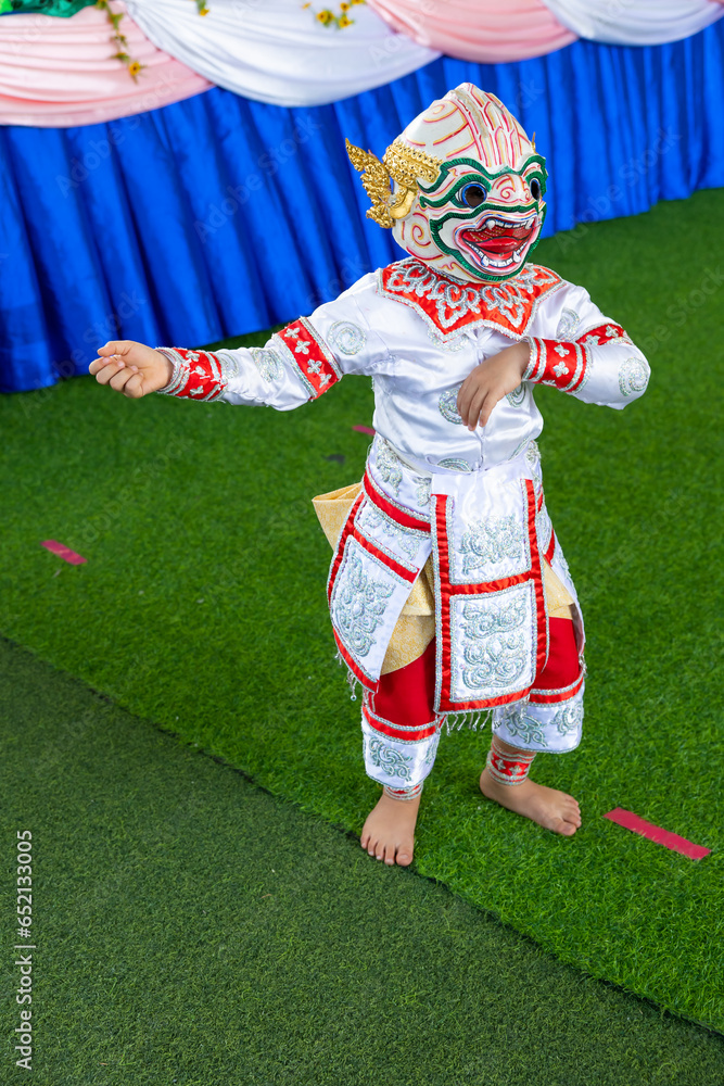 Happy and smile Asian boy wearing Hanuman Khon. Hanuman is Thailand ...
