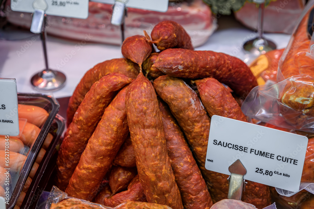 Artisanal smoked pork sausages on display at a butcher shop on the ...