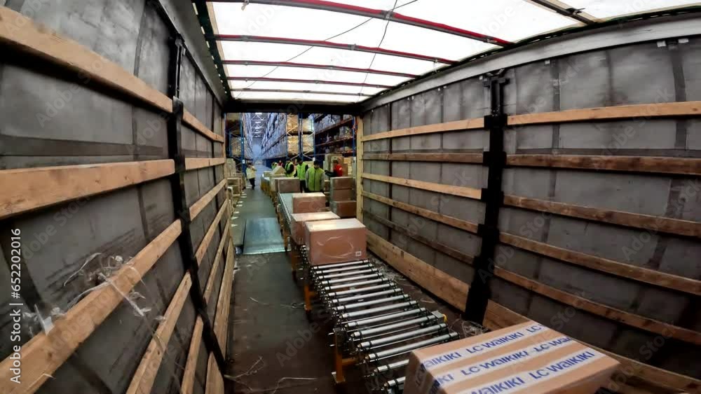 Truck Loading & Unloading Belt Conveyor. Boxes Loading and Unloading ...