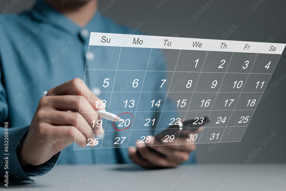 Work organization concept. Businessman checking agenda planner on ...
