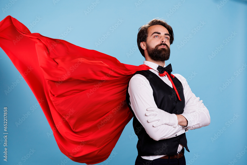 Strong man superhero with fantasy cape feeling confident in front of ...