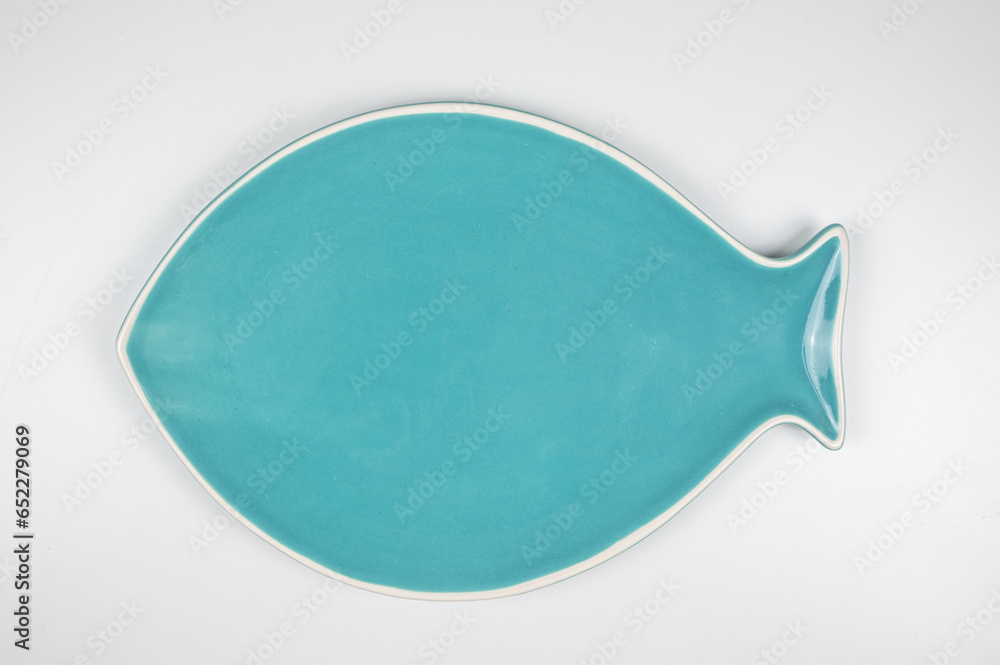Blue fish-shaped container with white background, with space to write ...