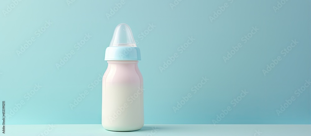 Infant formula on a isolated pastel background Copy space with a ...