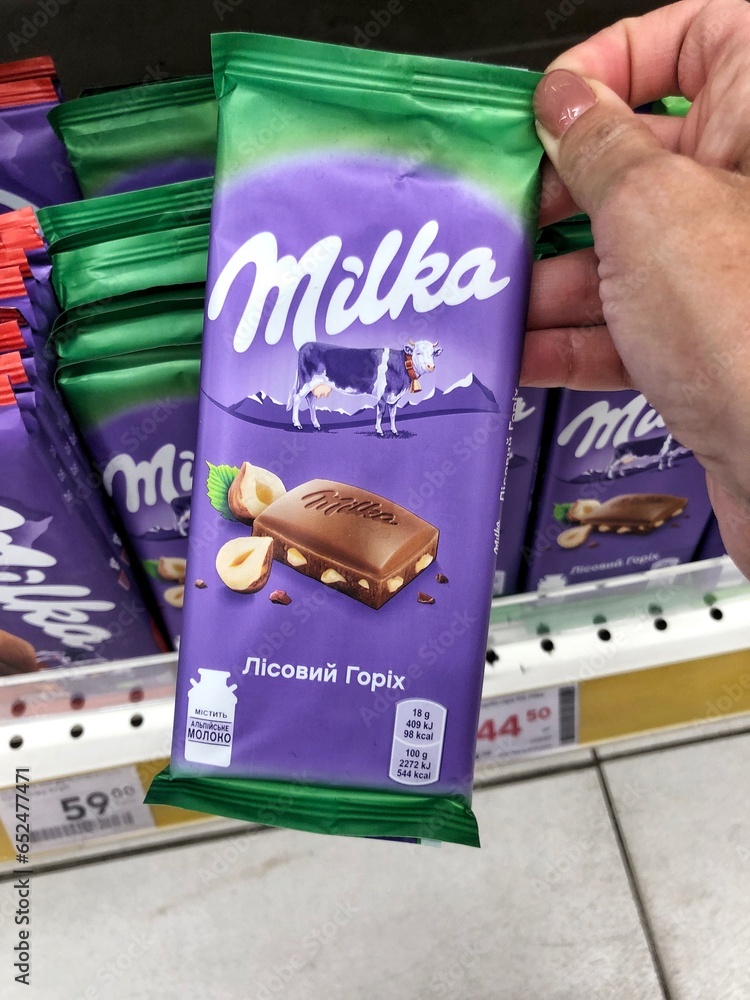 25.09.2023, Ukraine, Kharkiv, Milka chocolate on store shelves. Many ...