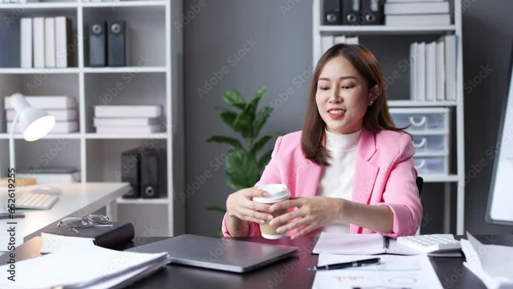 Young businesswoman having pain and fatigue in her shoulders and neck ...