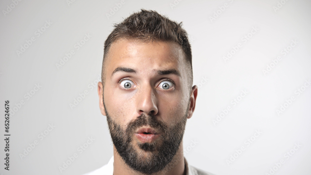 Handsome person look at camera close up. Young adult man face portrait ...