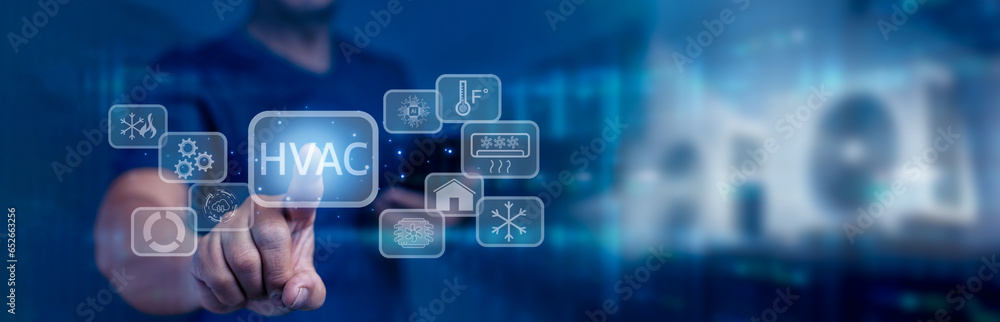 Businessman touching on virtual screen and presses HVAC button. Use of ...