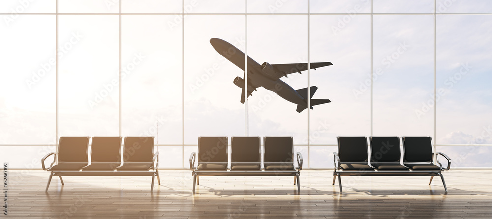 Modern airport interior with seats and flying airplane seen through ...