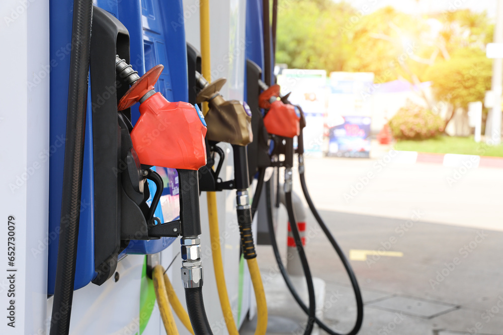 Refill and filling Oil Gas Fuel at station. Gas station - refueling. To ...