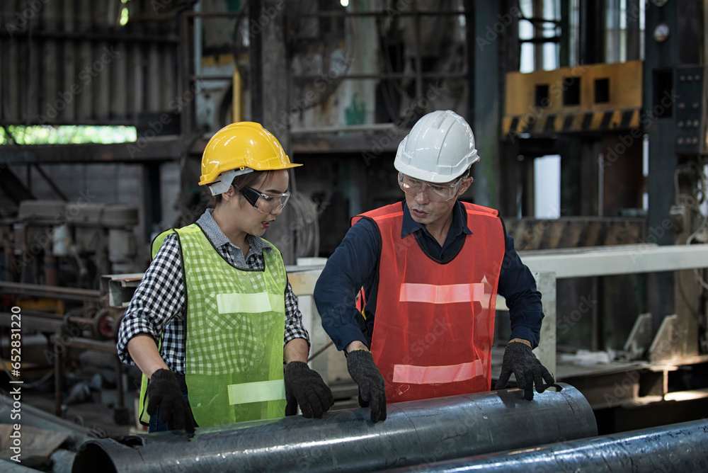 workers at work. Industrial workers are working on projects in large ...