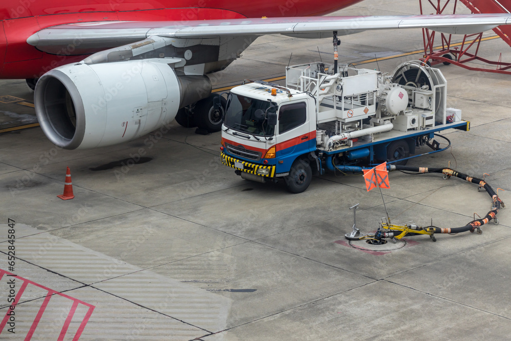 Aircraft refueling by high pressure fuel supply truck. Refueling ...