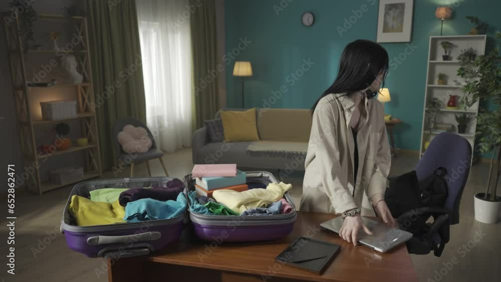 Video of a teenager, teen, young woman packing her belongings in a ...
